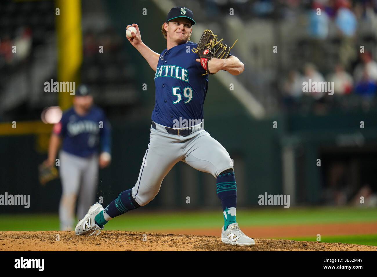 Seattle Mariners pitcher Troy Taylor throws a pitch to the Texas ...