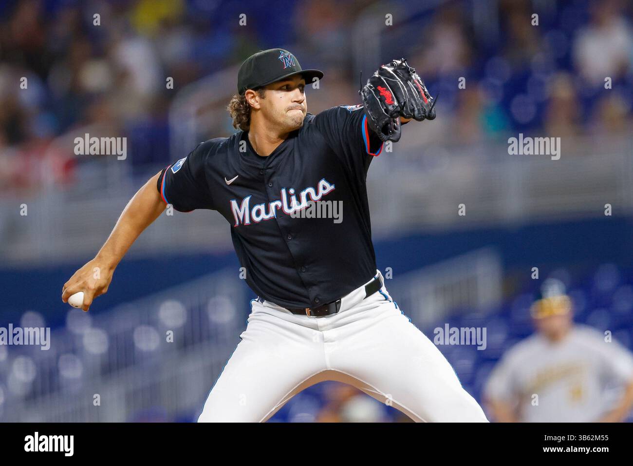 MIAMI, FL - MAY 02: Tyler Phillips #30 of the Miami Marlins pitches the ...