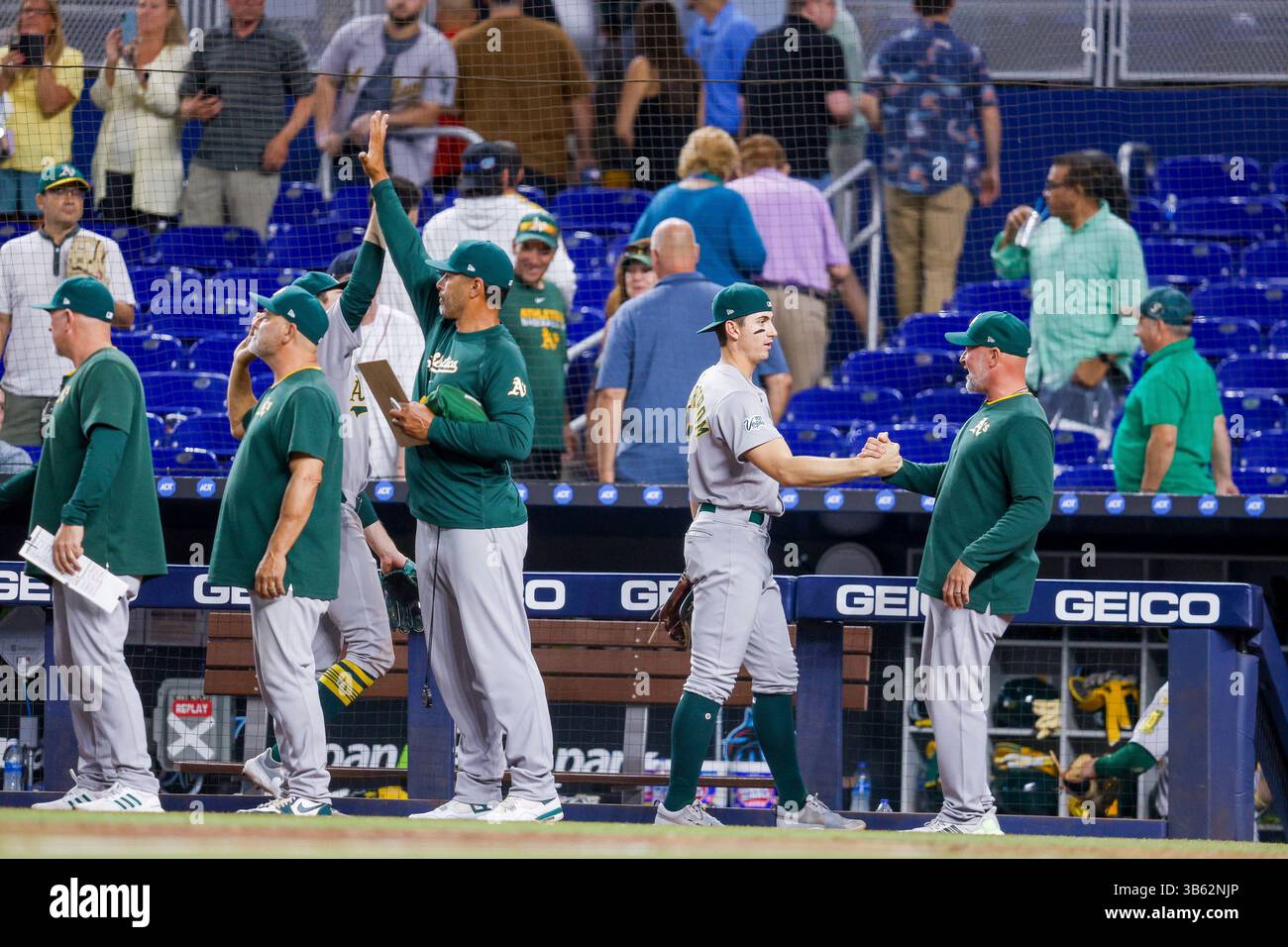 MIAMI, FL - MAY 02: Oakland Athletics players celebrate the win ...