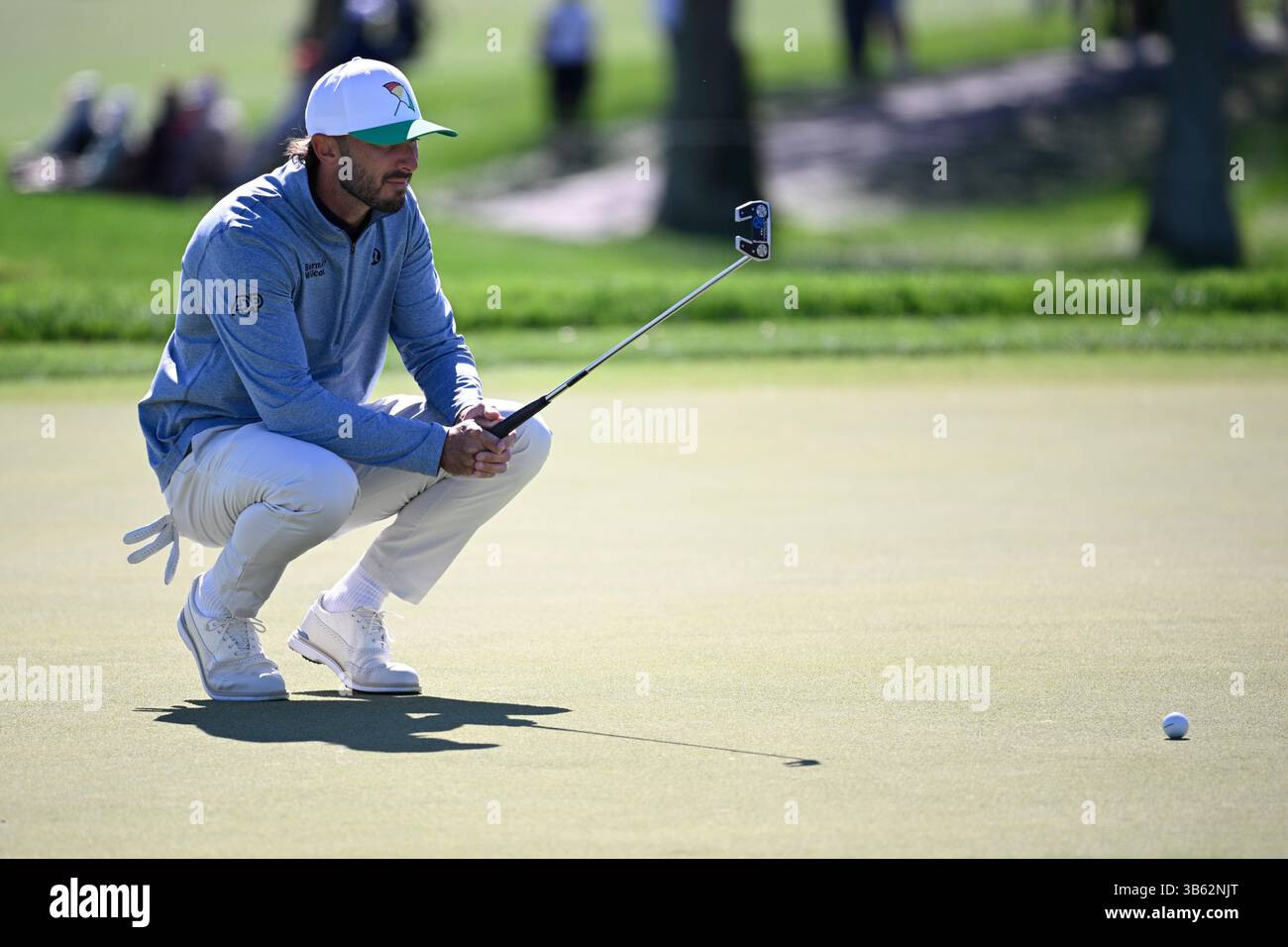 Max Homa lines up his putt on the seventh green during the first round of the Arnold Palmer ...
