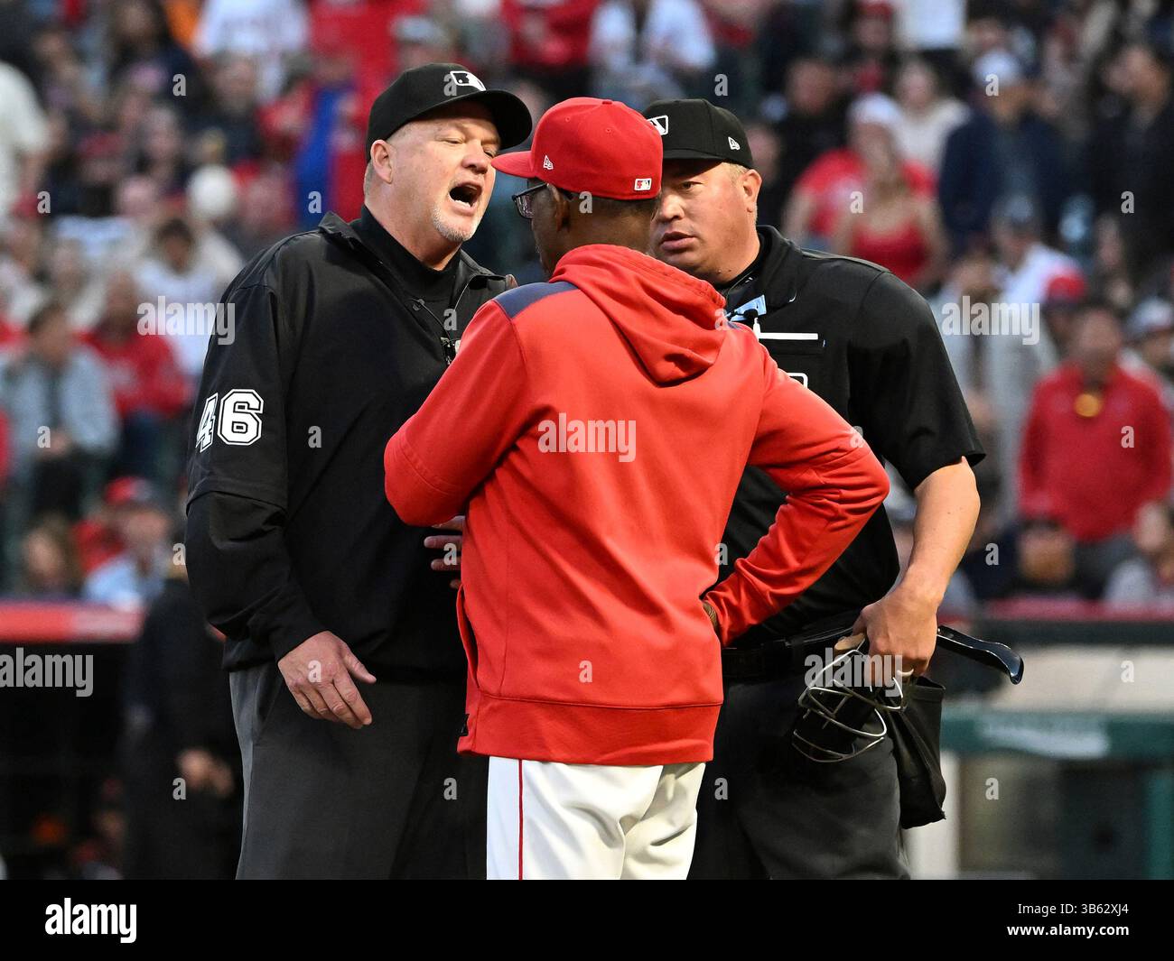 ANAHEIM, CA - MAY 02: Third base umpire Ron Kulpa (46) and home plate ...