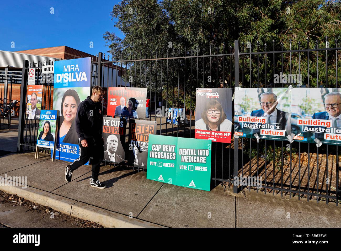 Campaign posters and signs are seen outside a polling centre on ...