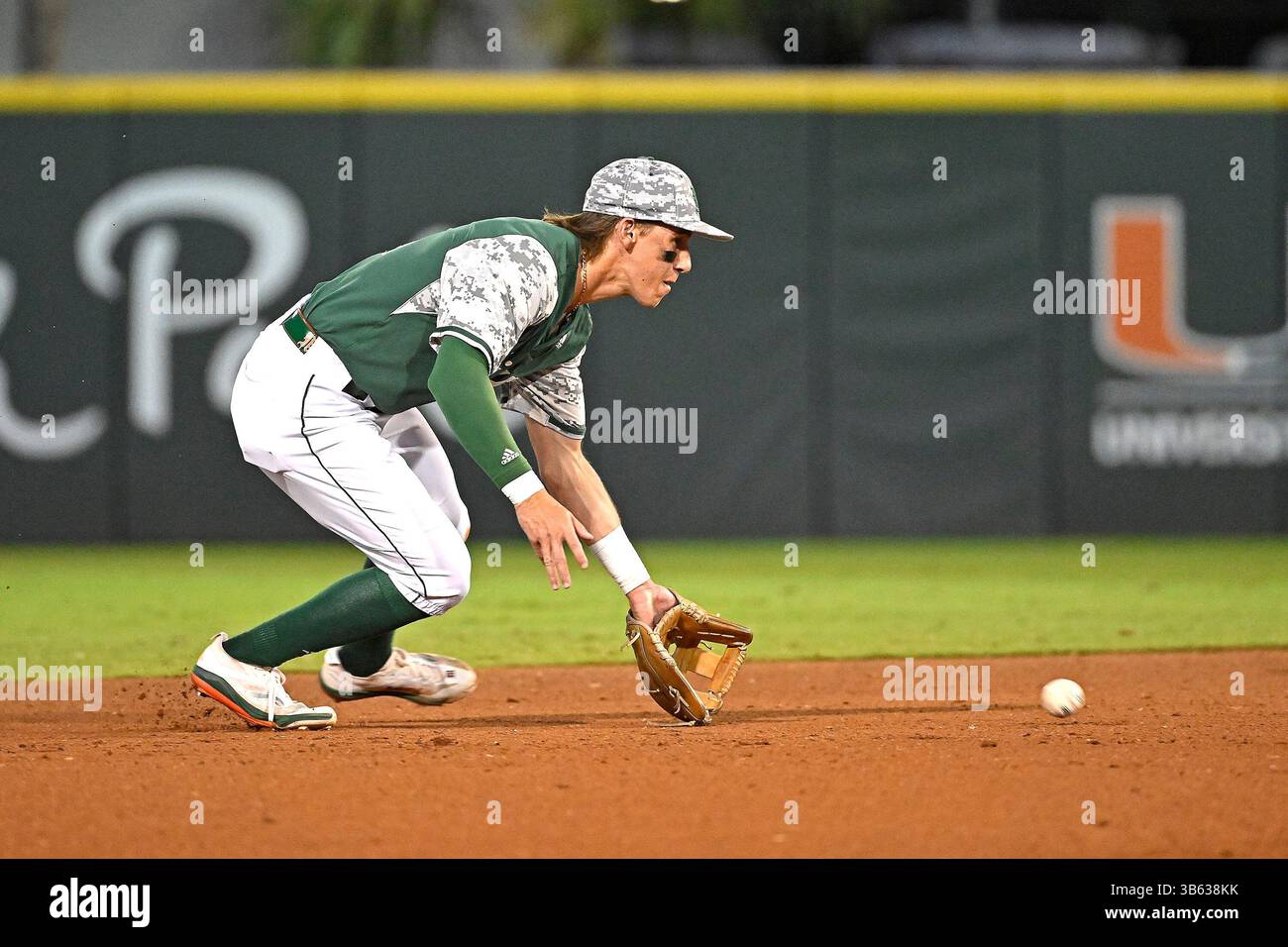 CORAL GABLES, FL - MAY 02: Miami infielder Jake Ogden (4) fields a ...