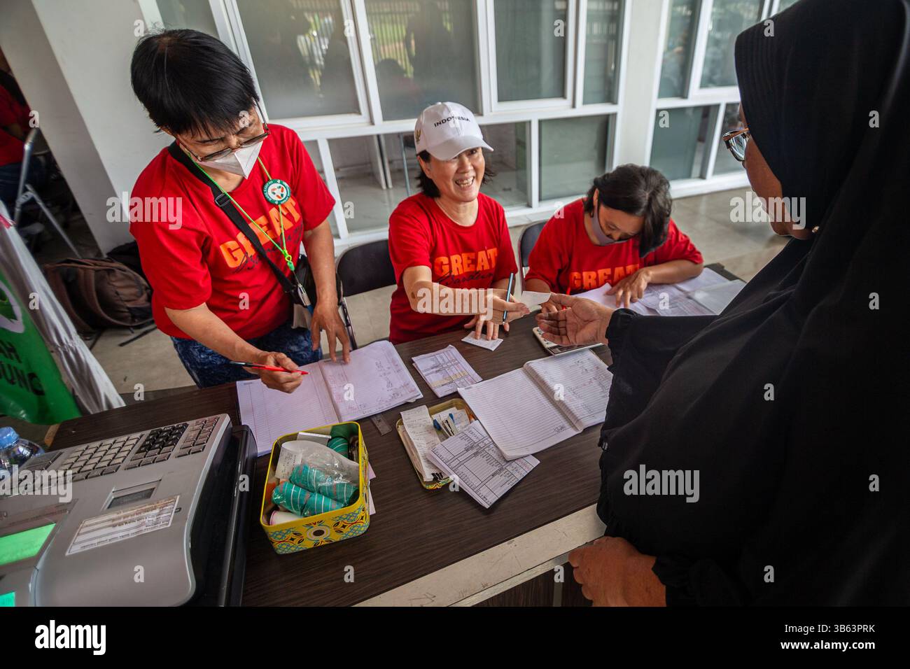 May 2, 2025, Bandung, West Java, Indonesia: Workers give vouchers to ...