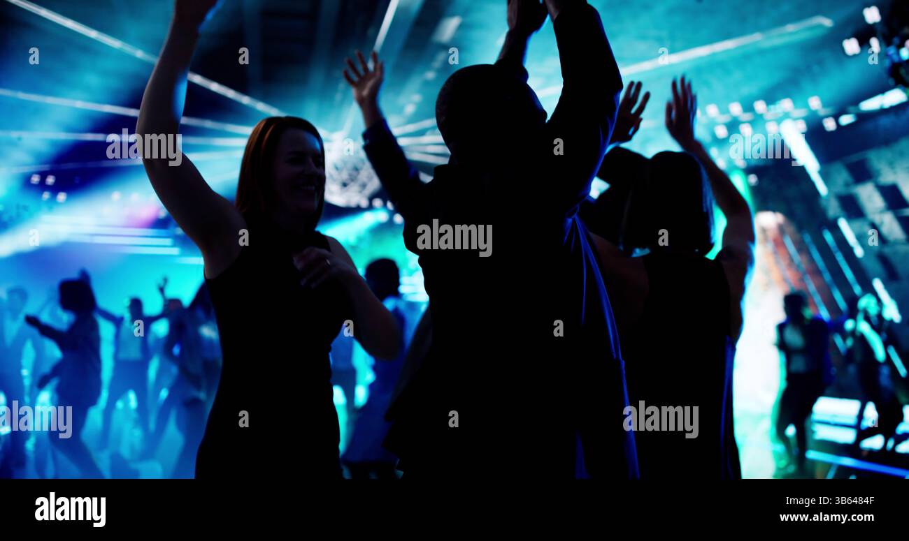 Nightclub DJ Spinning Beats, Crowd Dancing In Silhouette Motion Stock ...