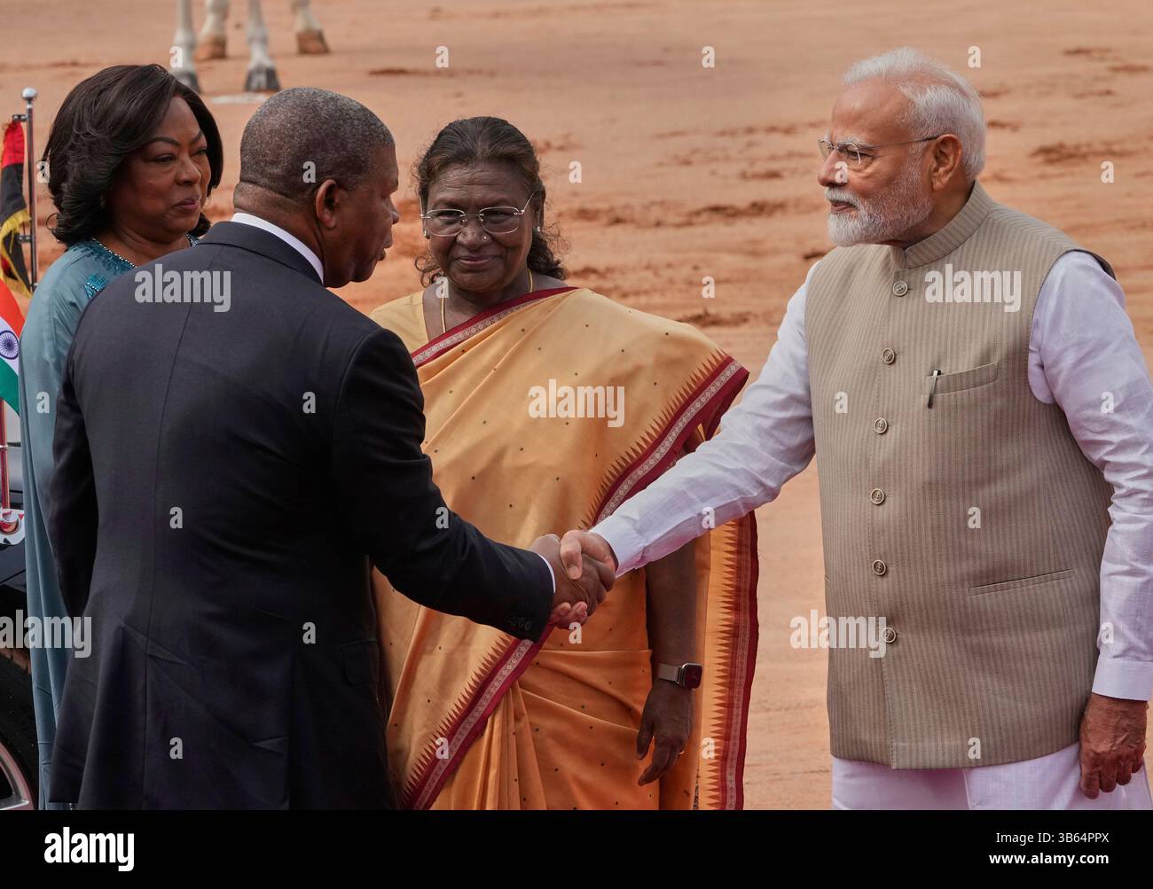 Indian Prime Minister Narendra Modi, right, welcomes Angola's President ...
