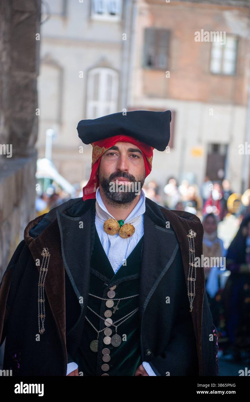 Men in traditional Sardinian attire during the Sant'Efisio celebration ...