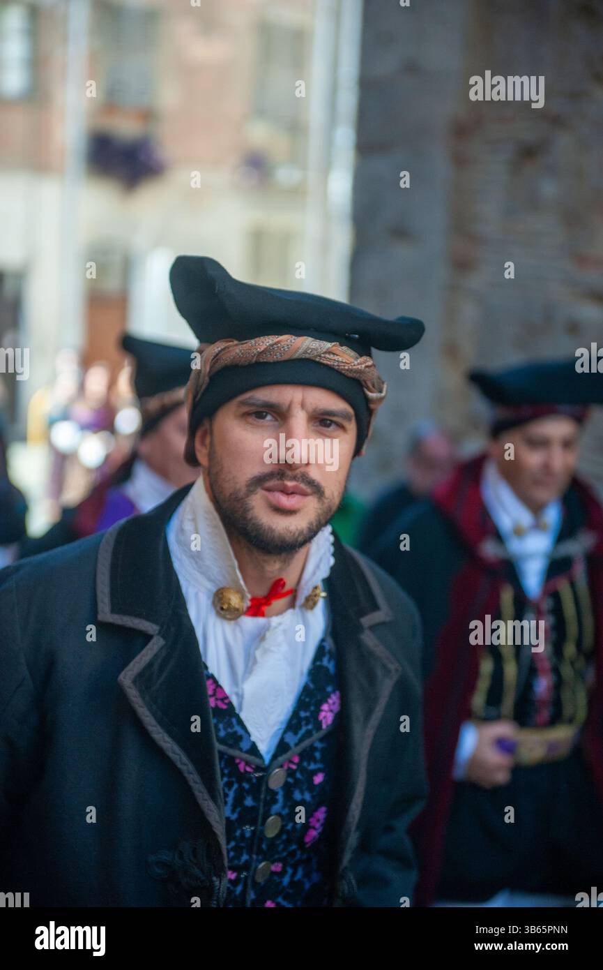 Men in traditional Sardinian attire during the Sant'Efisio celebration ...