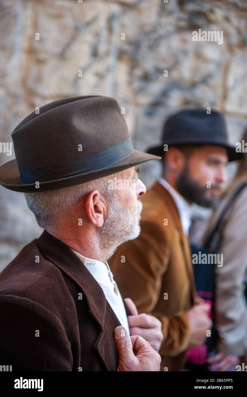 Men in traditional Sardinian attire during the Sant'Efisio celebration ...