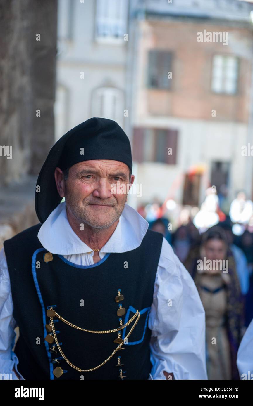 Men in traditional Sardinian attire during the Sant'Efisio celebration ...