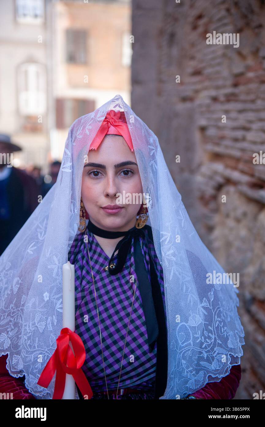 Women in traditional Sardinian dress during the Sant'Efisio celebration ...