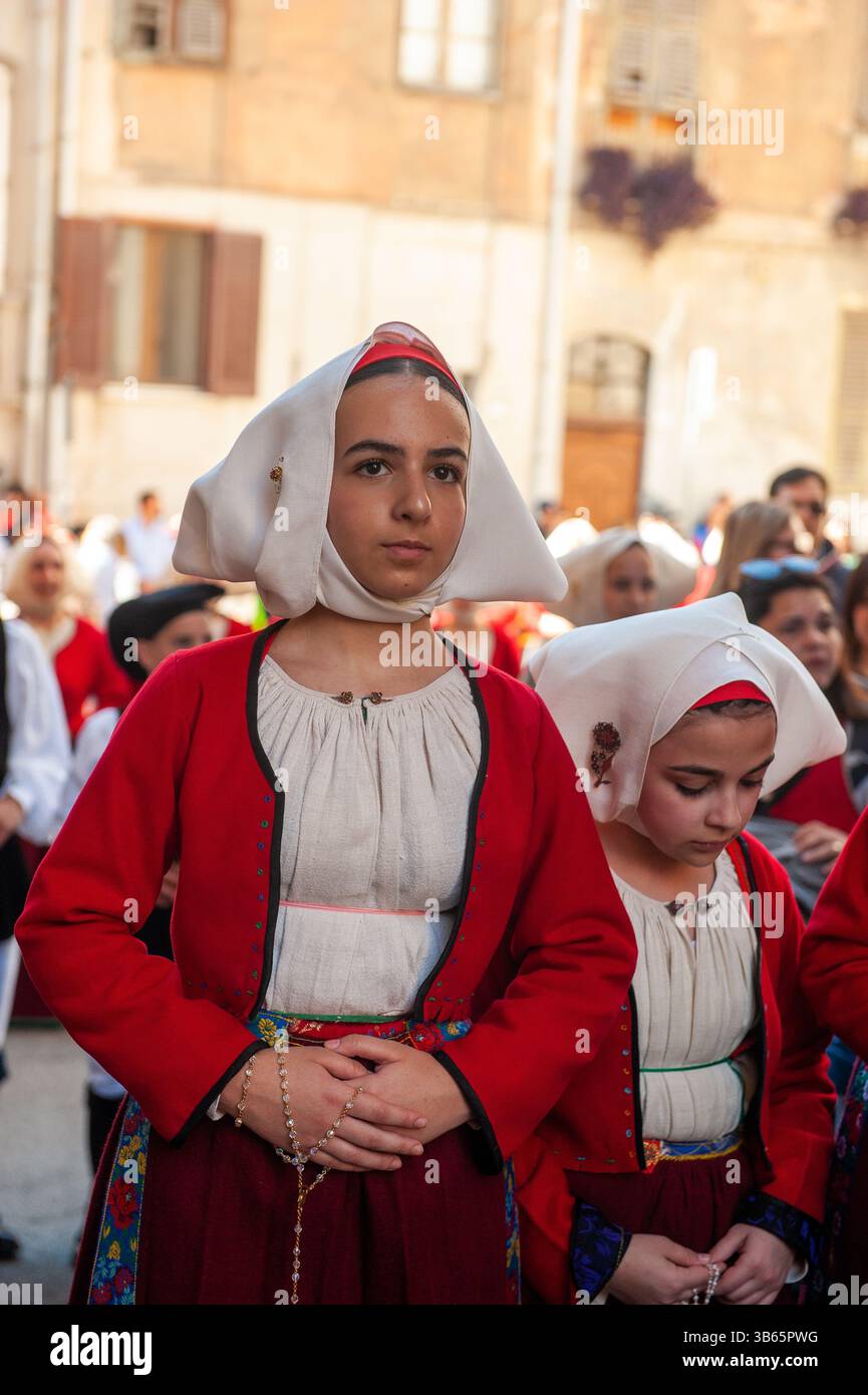 Women in traditional Sardinian dress during the Sant'Efisio celebration ...