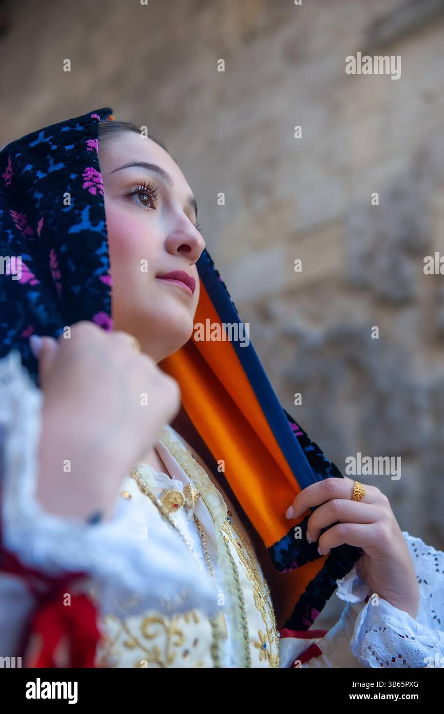 Women in traditional Sardinian dress during the Sant'Efisio celebration ...