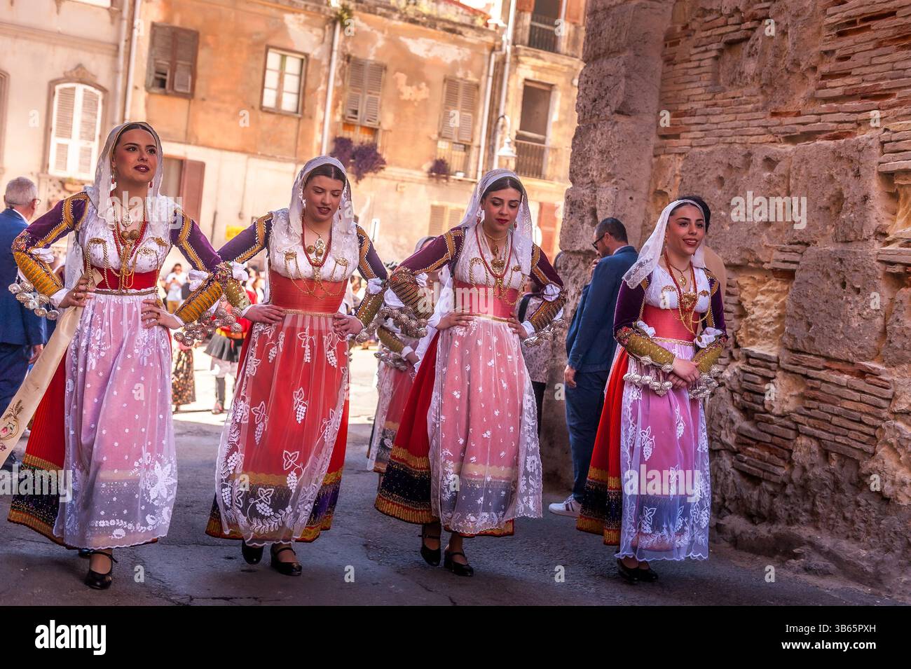 Women in traditional Sardinian dress during the Sant'Efisio celebration ...