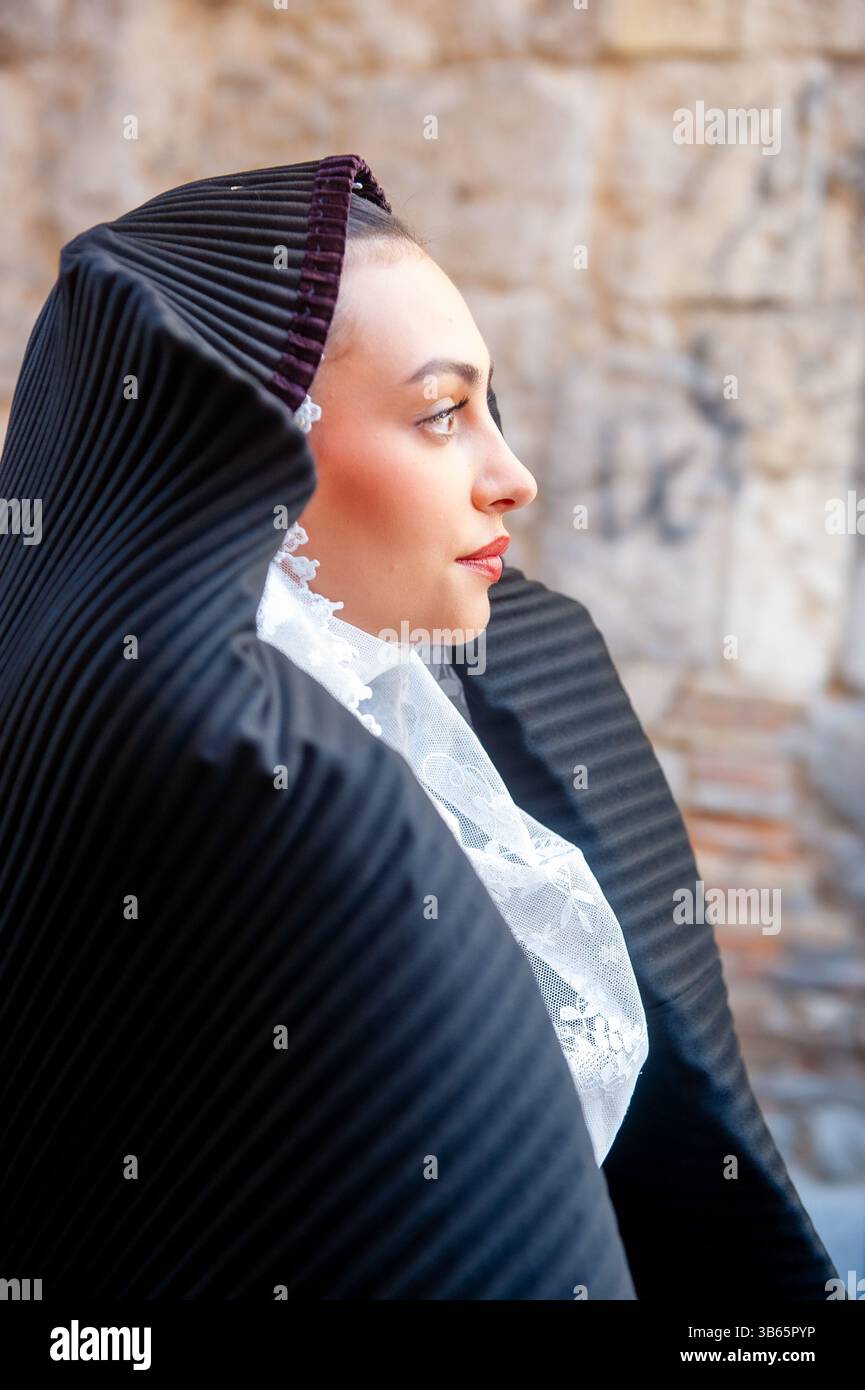 Women in traditional Sardinian dress during the Sant'Efisio celebration ...