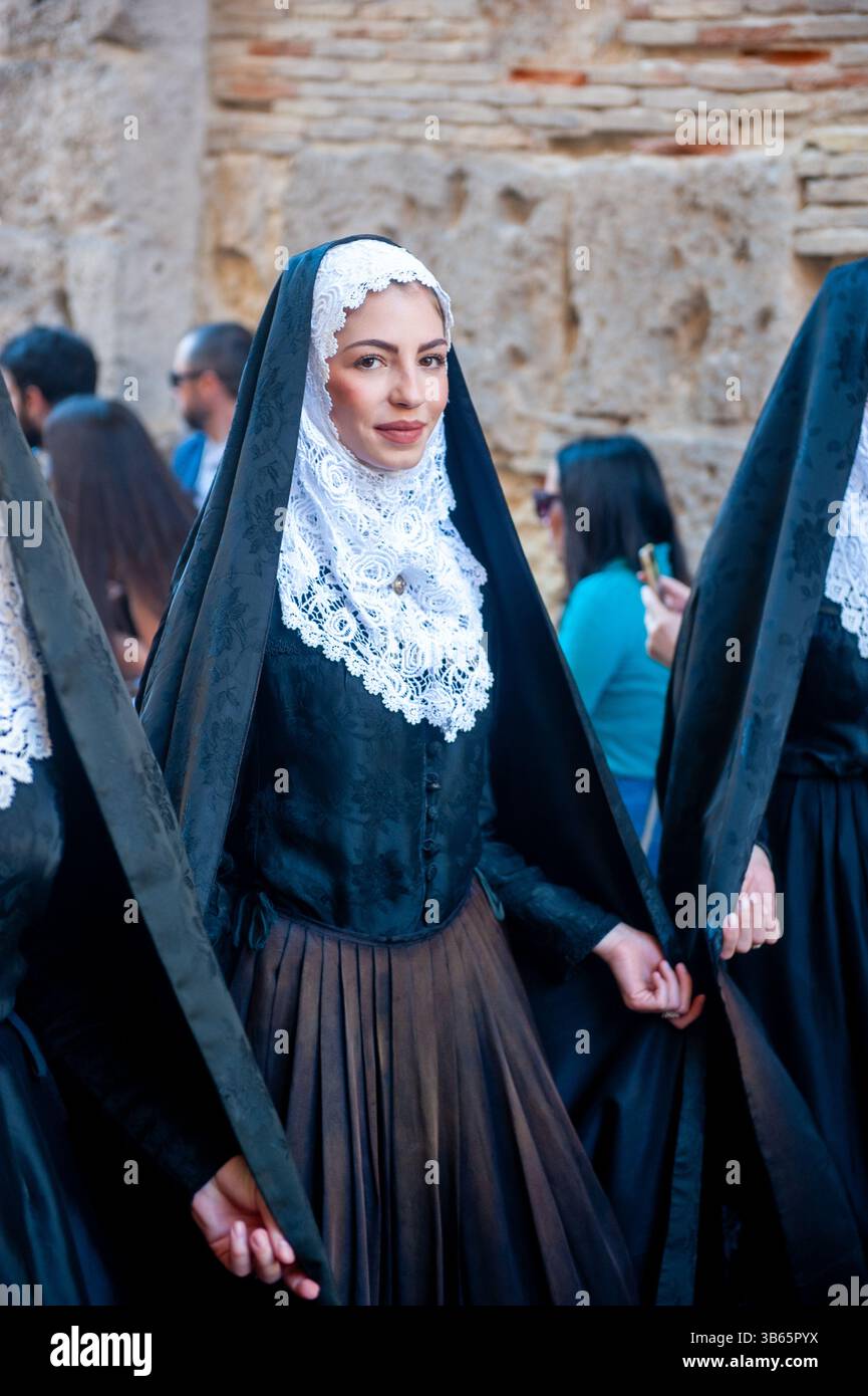 Women in traditional Sardinian dress during the Sant'Efisio celebration ...