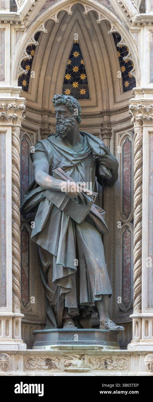 FLORENCE, ITALY - MARCH 17, 2025: The bronze statue St. Luke the ...