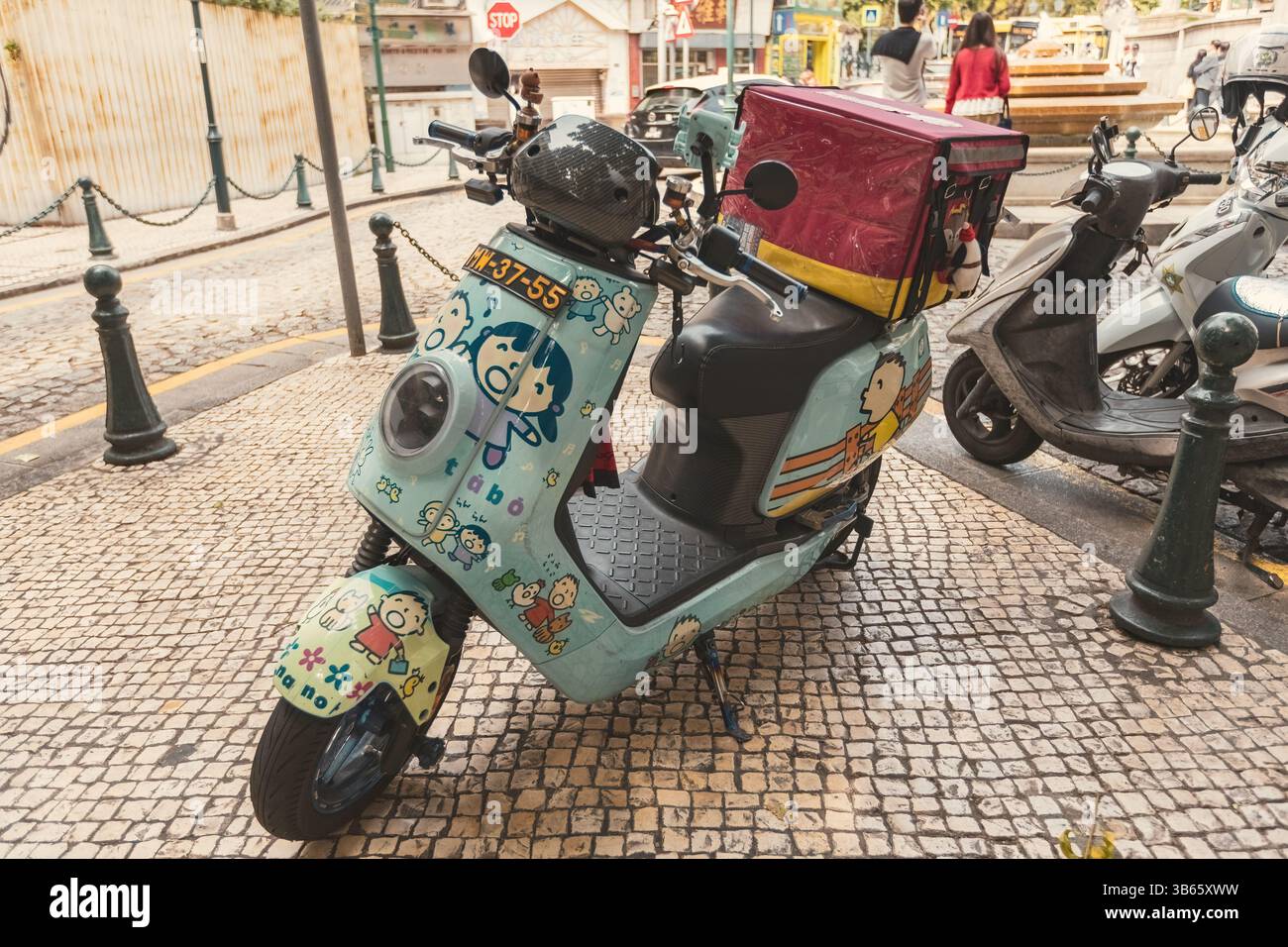 Cool decorated electric scooter on the street of Macau city Stock Photo ...