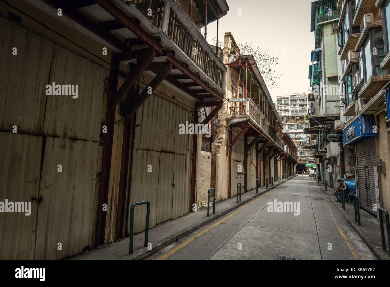 Old town street in Macau, historical chinese and portuguese buildings ...