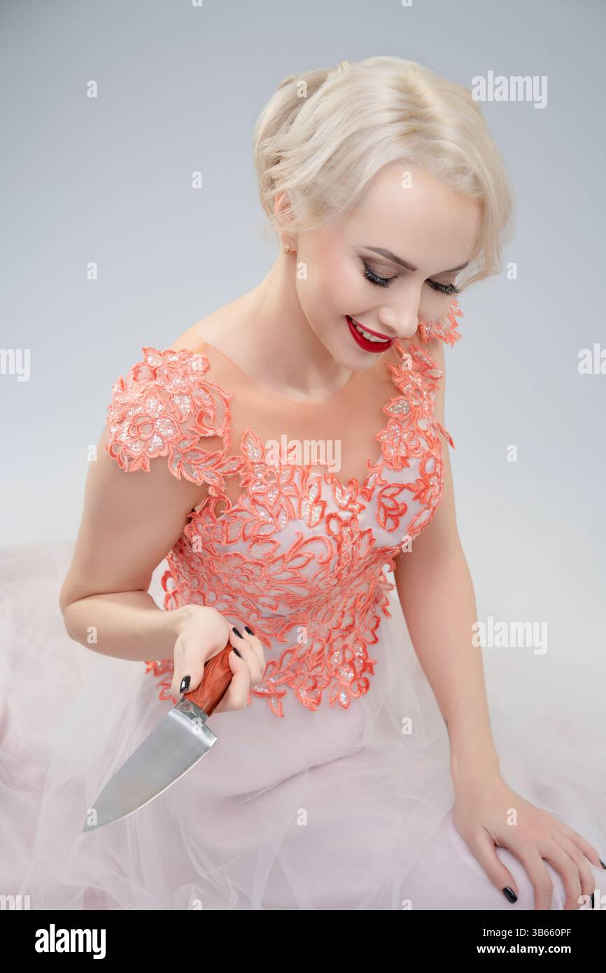 This striking depiction features a woman in a wedding dress with ...