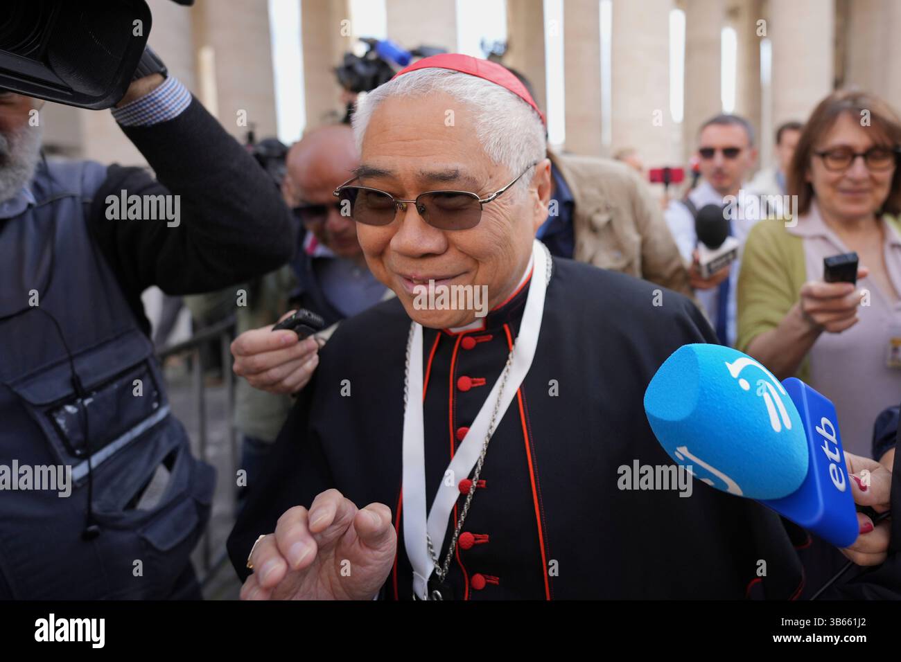 Cardinal William Seng Chye Goh arrives at the Vatican, Saturday, May 3, 2025, to attend the ...