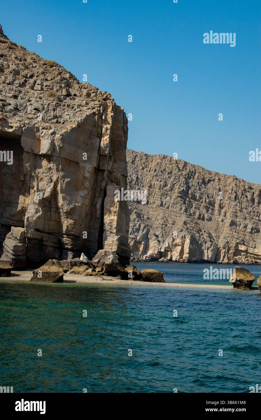 Oman: mountains, rock formations and small islands in the calm waters ...