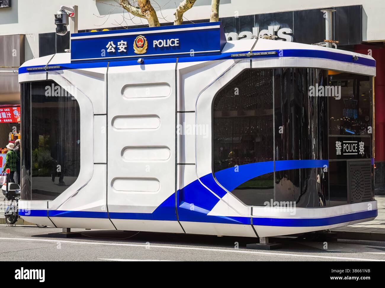 Shanghai, China - 1 April 2025: Modern police booth on Yuyuan Road ...