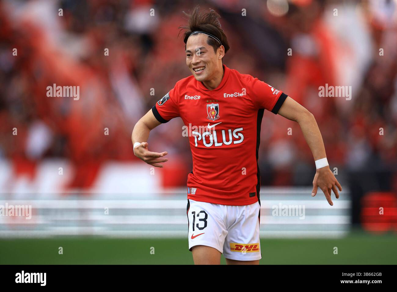 Ryoma Watanabe of Urawa Red Diamonds reacts after scoring in the first half of J1 League ...
