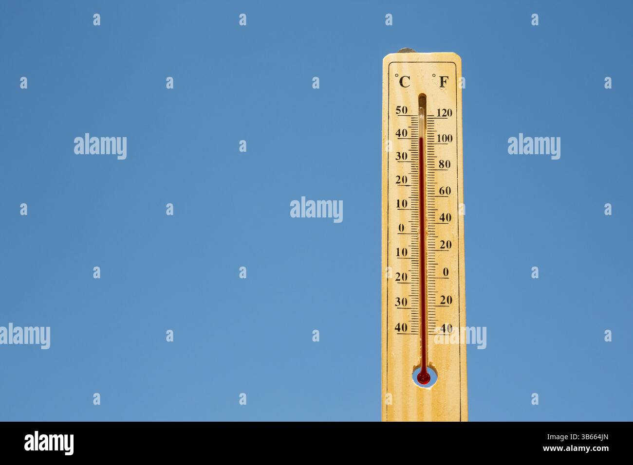 Mercury thermometer marking 40 degrees Celsius 100 Fahrenheit in a ...