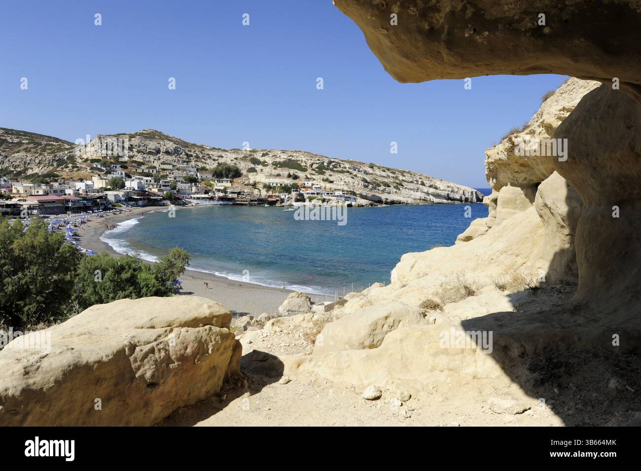 Prehistoric cave overlooking the beach of Matala, a village on the ...