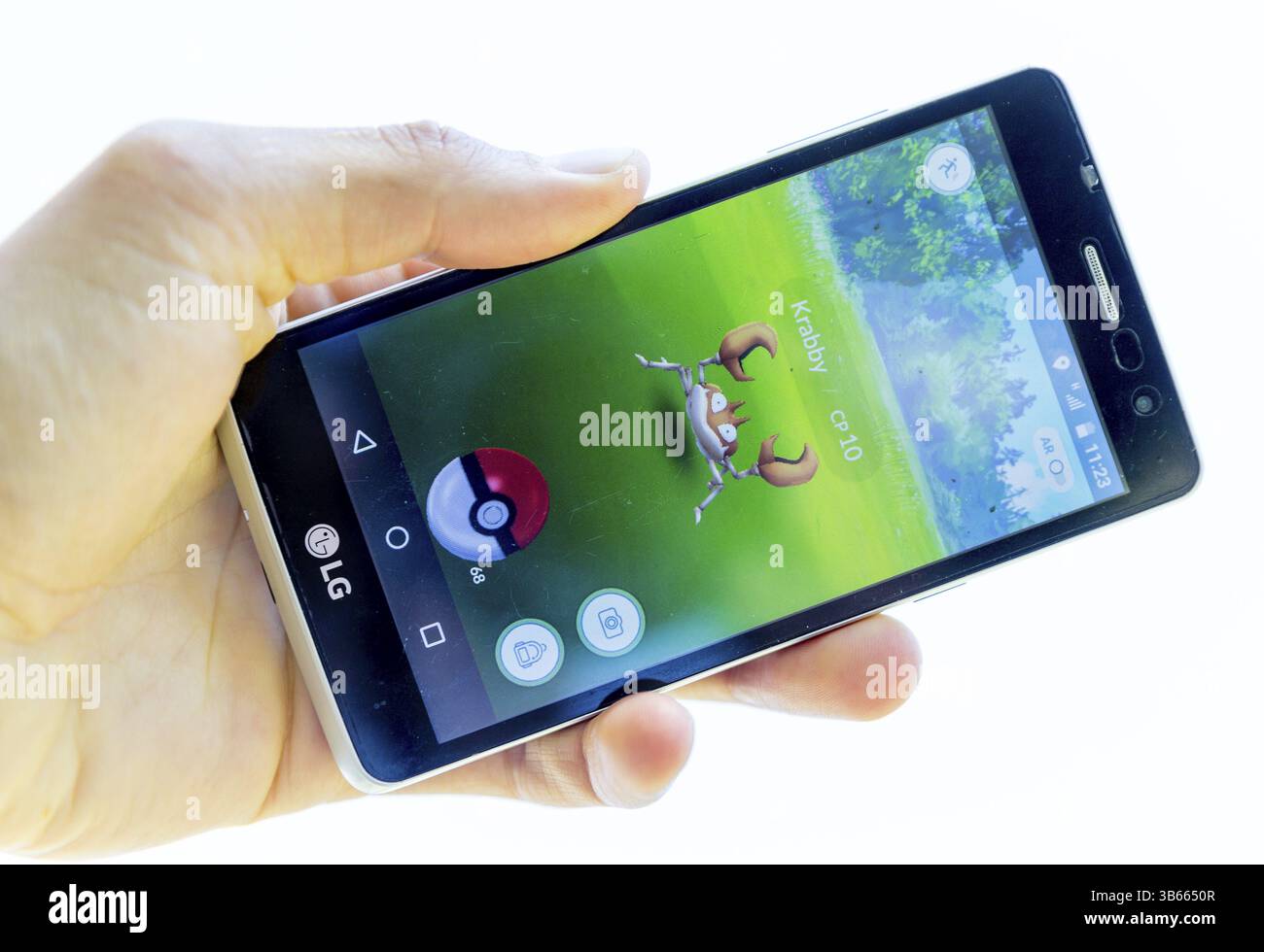 Sofia, Bulgaria - July 23, 2016: Man holds in her hand a mobile phone ...