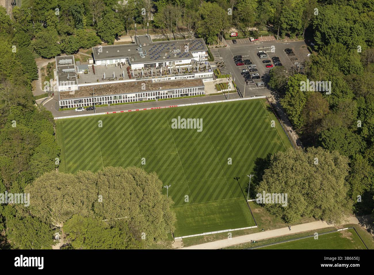 Outer green belt of the city of Cologne. Park with lawns, pond and ...