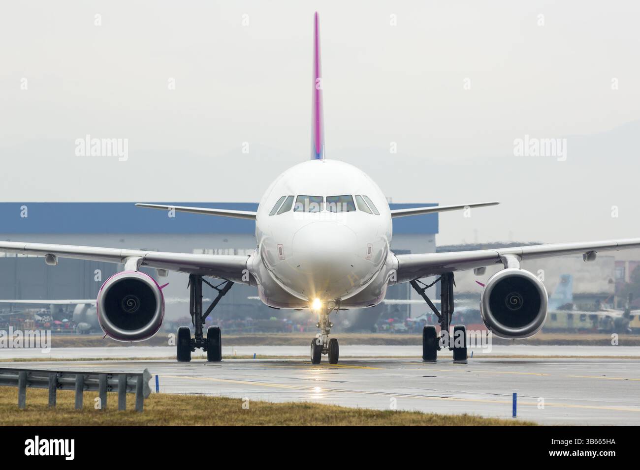 Airplane on the runway after landing at the airport Stock Photo - Alamy