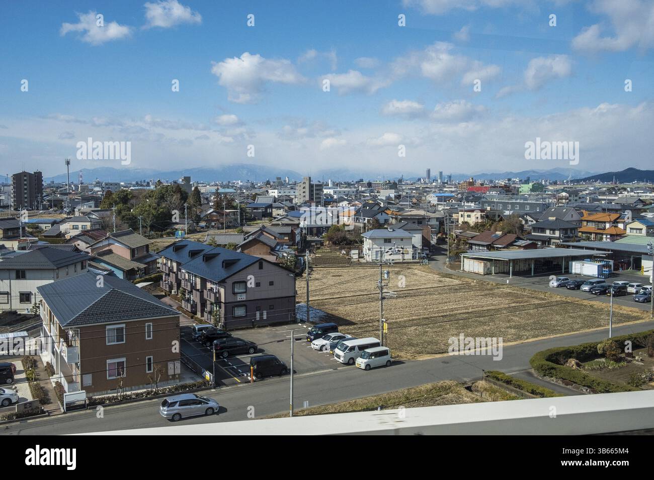 Urban and suburban landscape in Japan with a view of mountains Stock ...