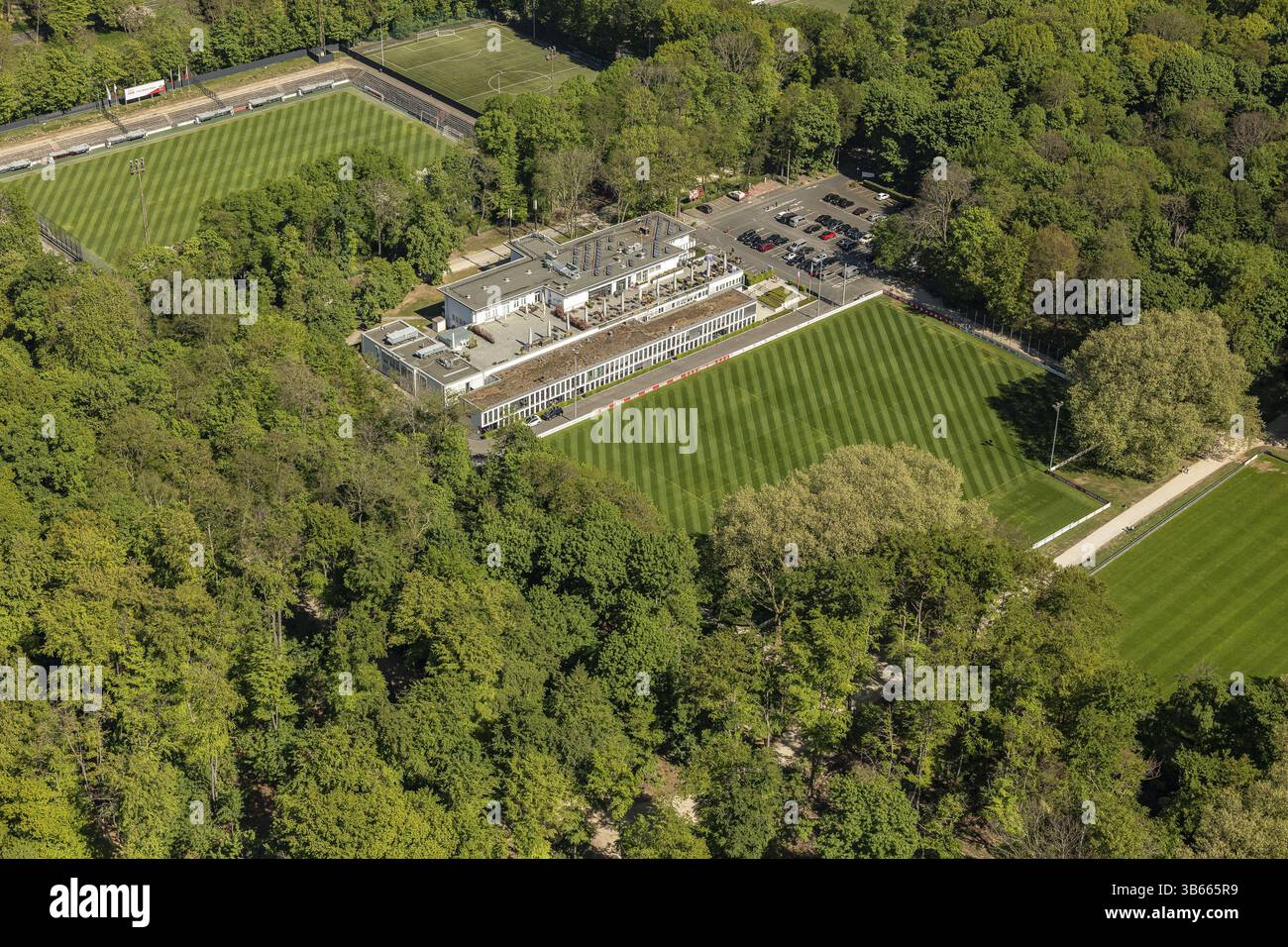 Outer green belt of the city of Cologne. Park with lawns, pond and ...