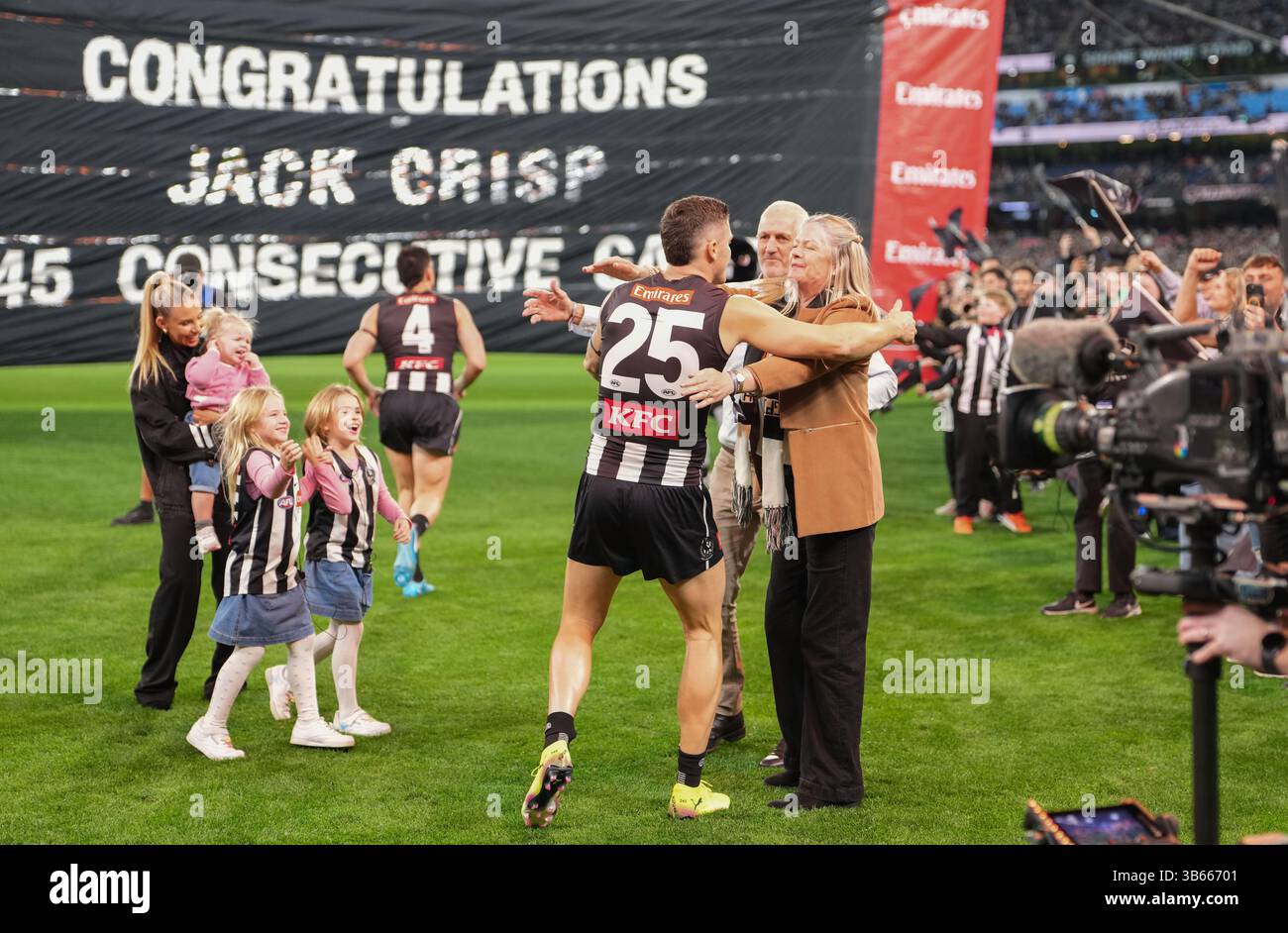Jack Crisp of the Magpies runs out to play his 245th consecutive match ...