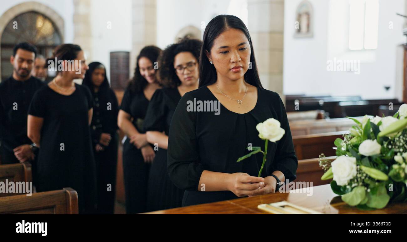Grief, woman and rose at funeral for farewell service, mourning death ...
