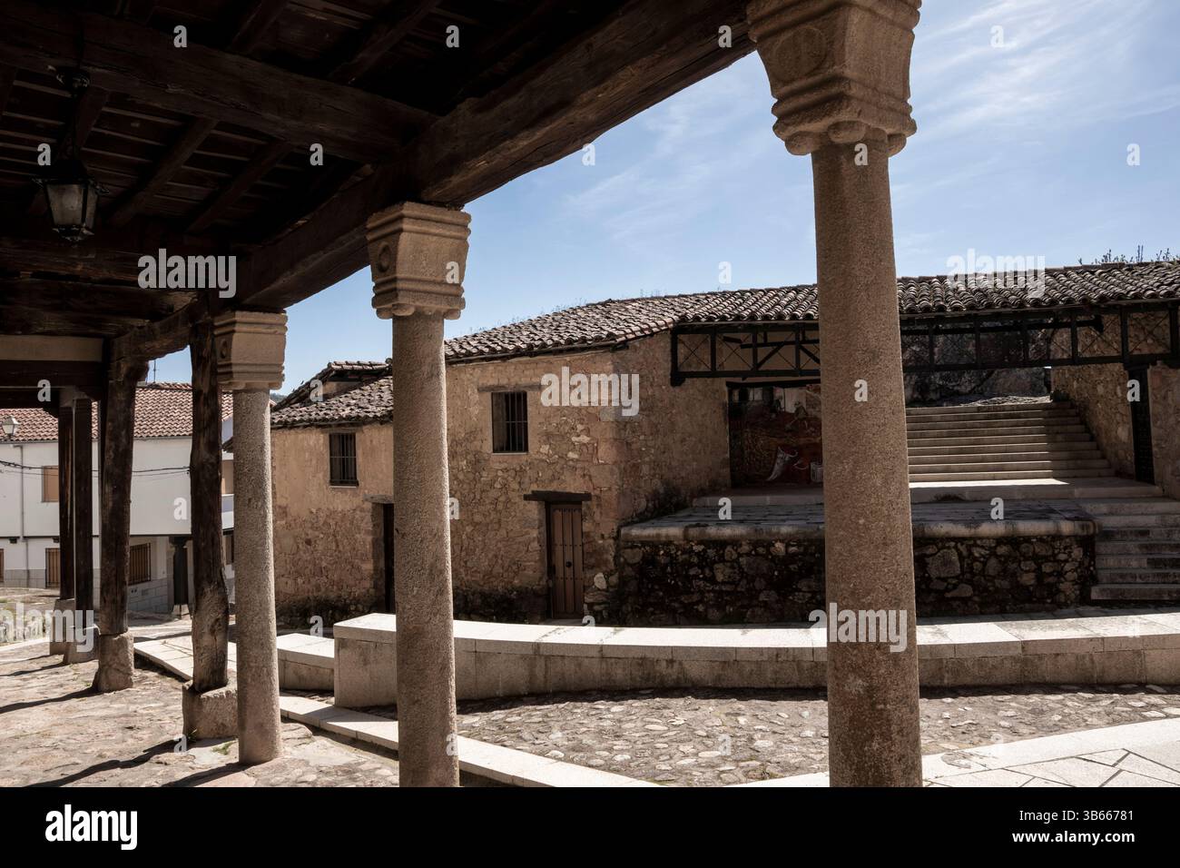 Cobblestone square in a traditional spanish town, featuring stone ...