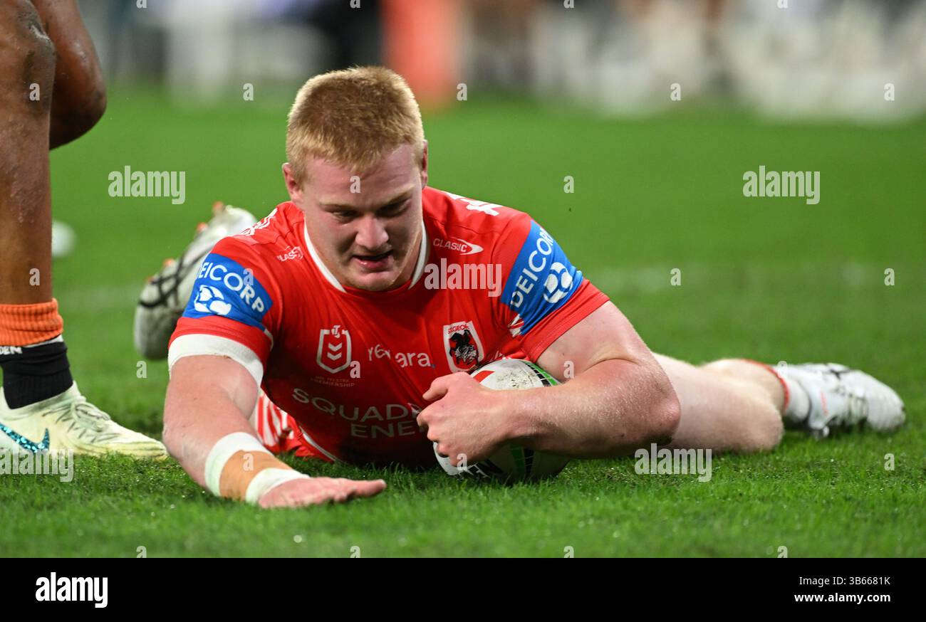 Brisbane, Australia. 03rd May, 2025. Dylan Egan of the Dragons scores a ...