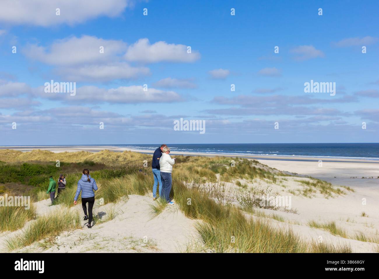 People standing on sea hi-res stock photography and images - Alamy