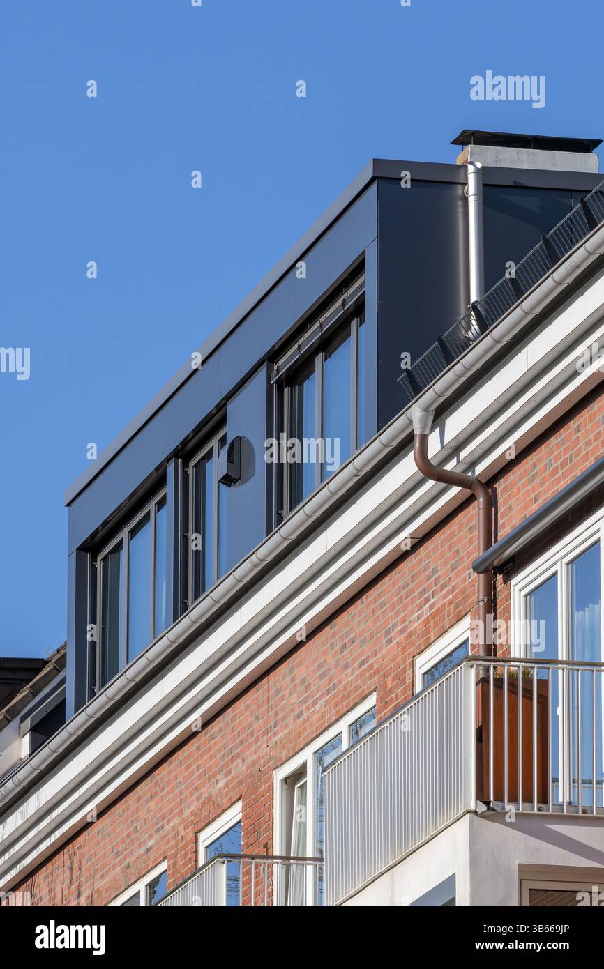 large dark dormer window on old clinker building Stock Photo - Alamy