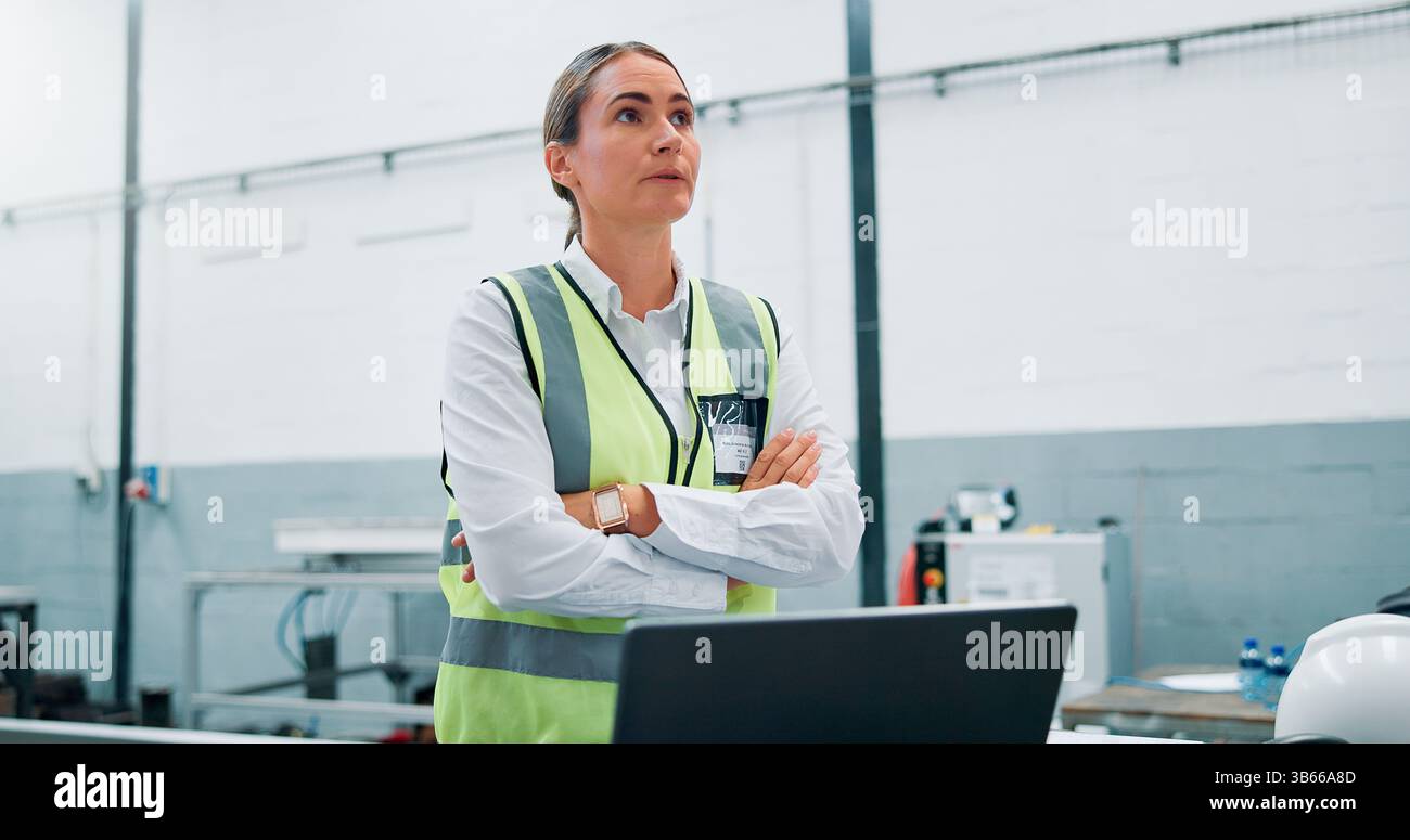 Engineer, problem solving and woman in factory for robotics ...