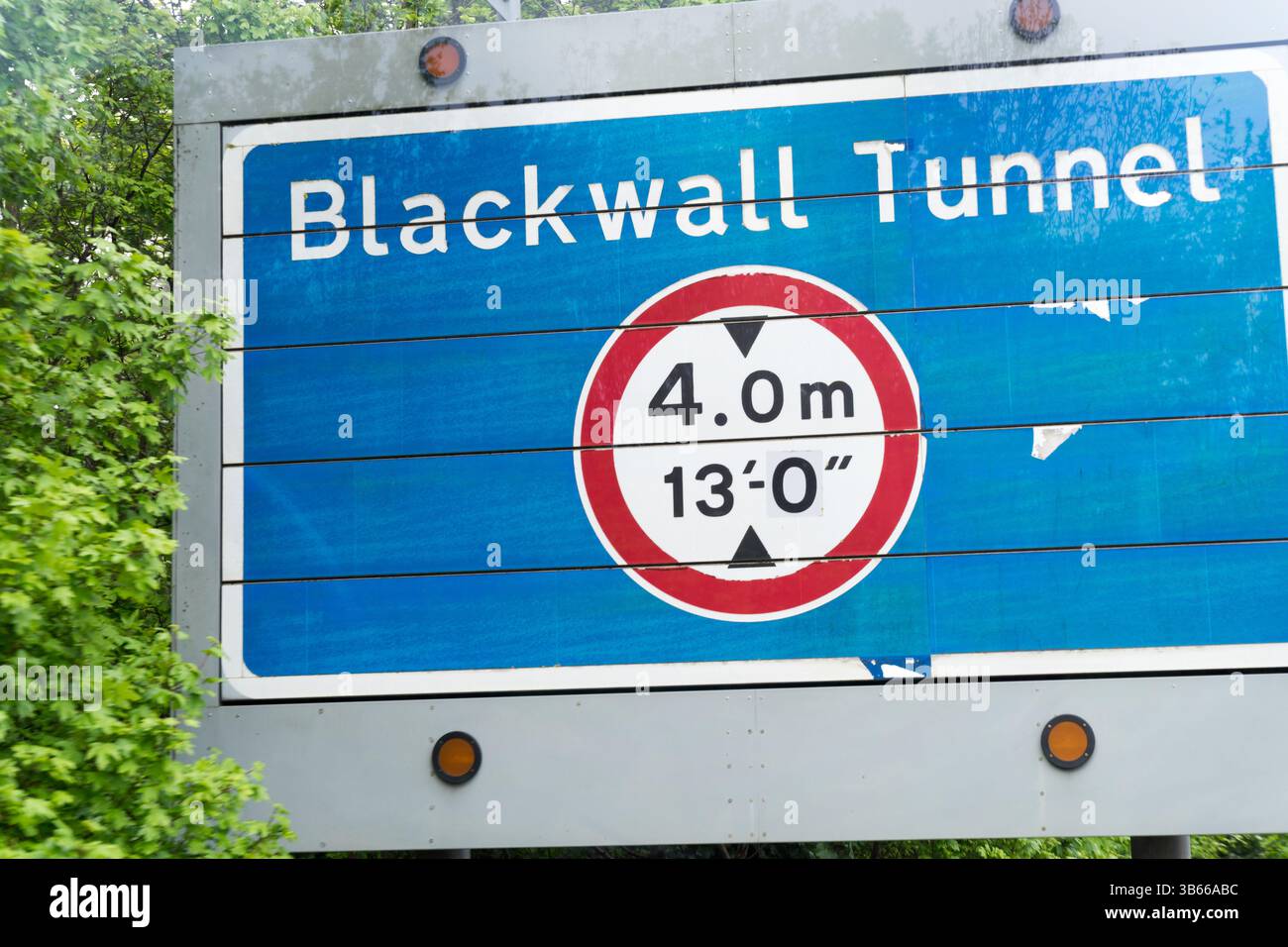 blackwall tunnel road signage in white lettering on blue background ...