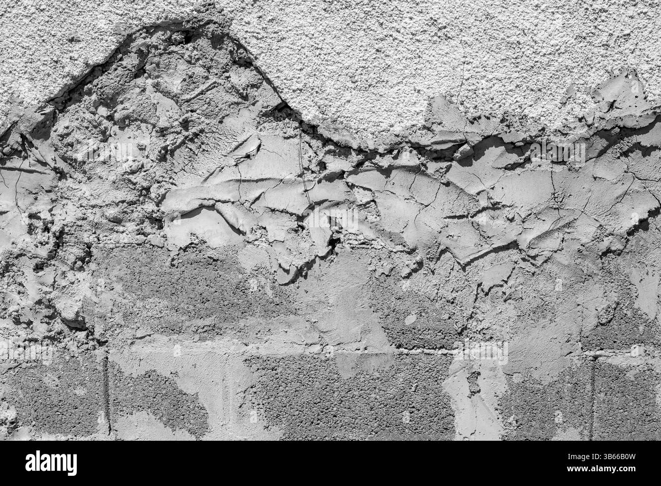 Repairing damaged wall outside with cement mortar messy strokes Stock ...