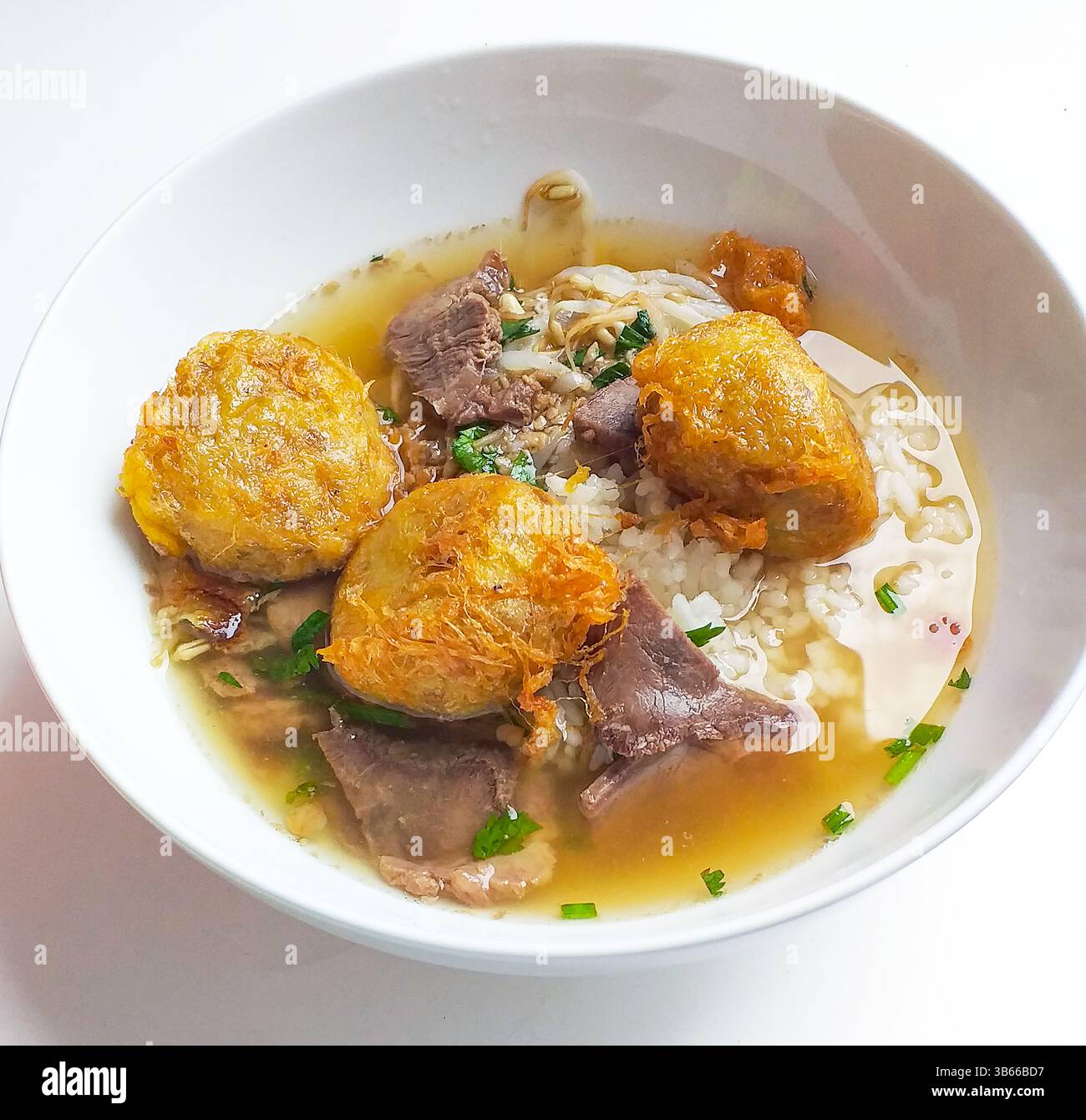 Indonesian Soto Daging Sapi or beef soup with white rice, bean sprouts ...
