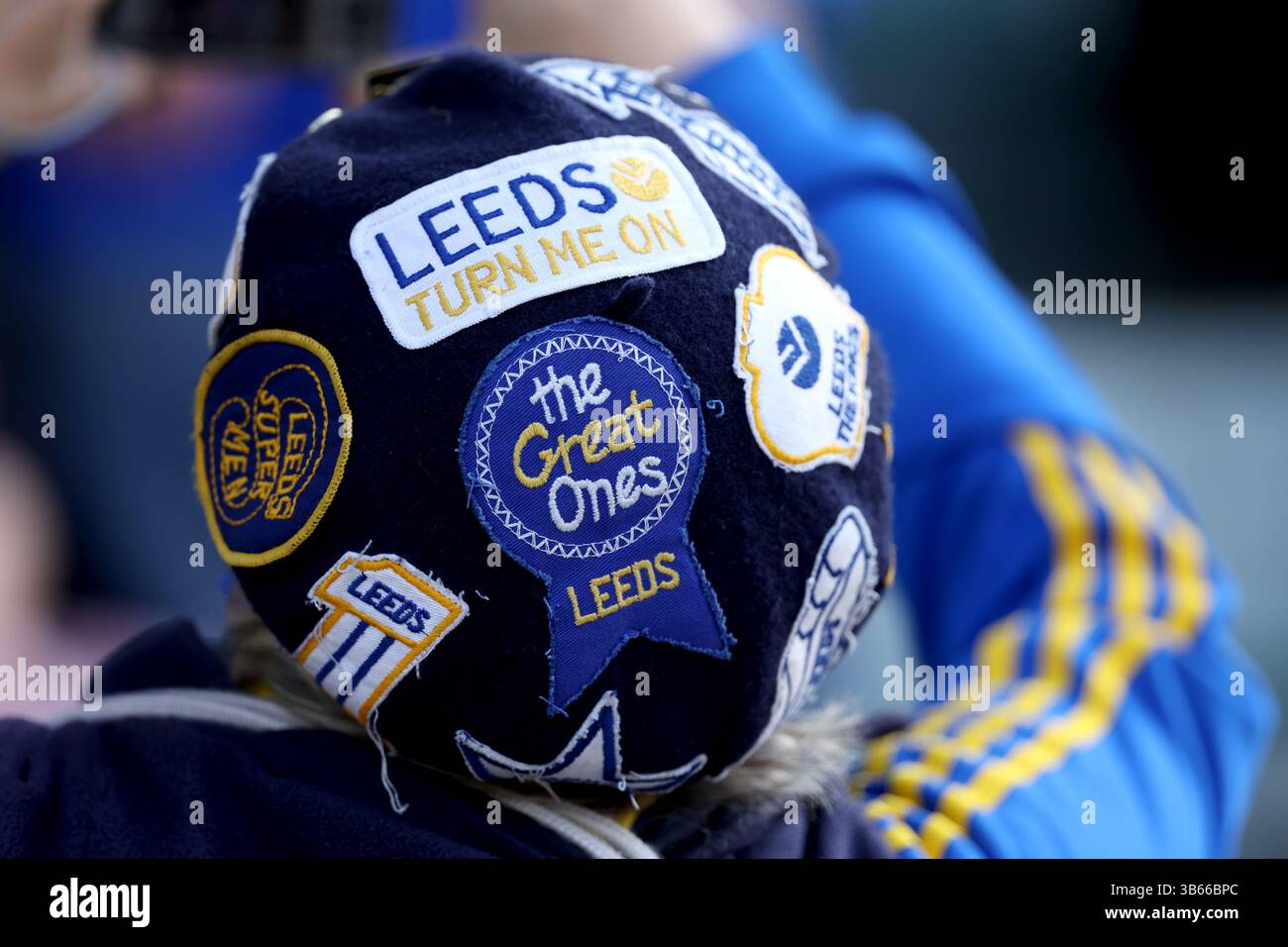 A Leeds United fan wearing a cap covered in patches before the Sky Bet ...