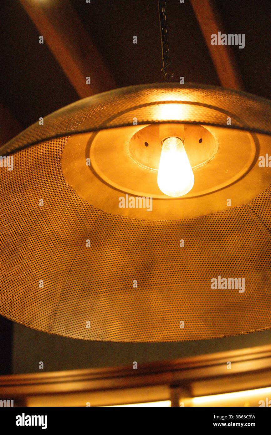 Hanging Edison light bulb, also known as filament light bulb. with ...