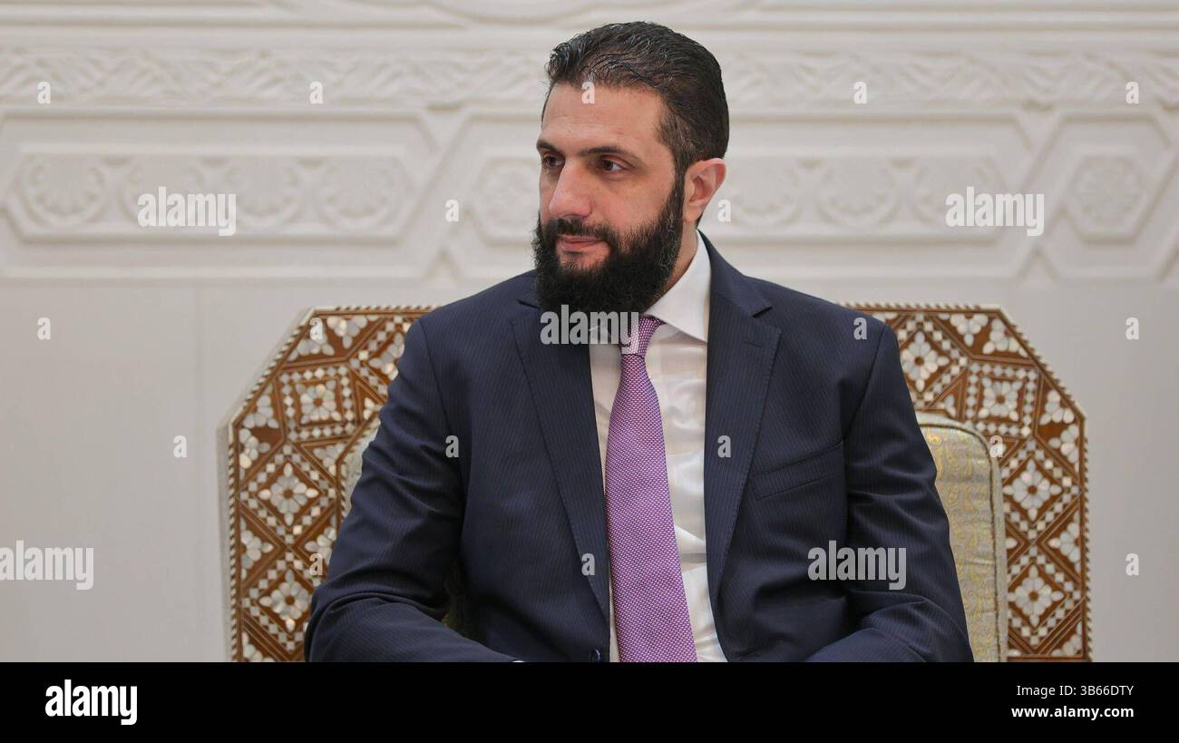 Syrian President, Ahmad al-Shara, meets with a US delegation headed by ...