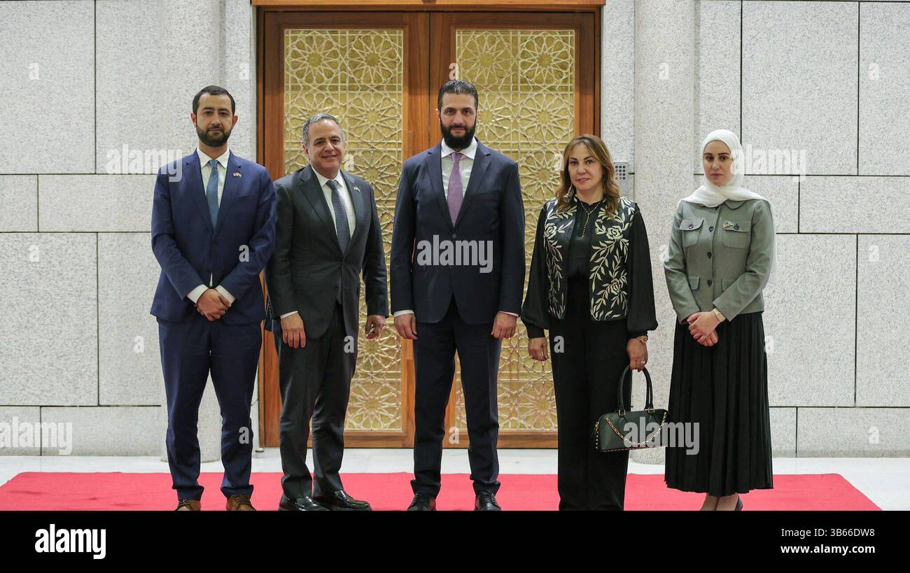 Syrian President, Ahmad al-Shara, meets with a US delegation headed by ...
