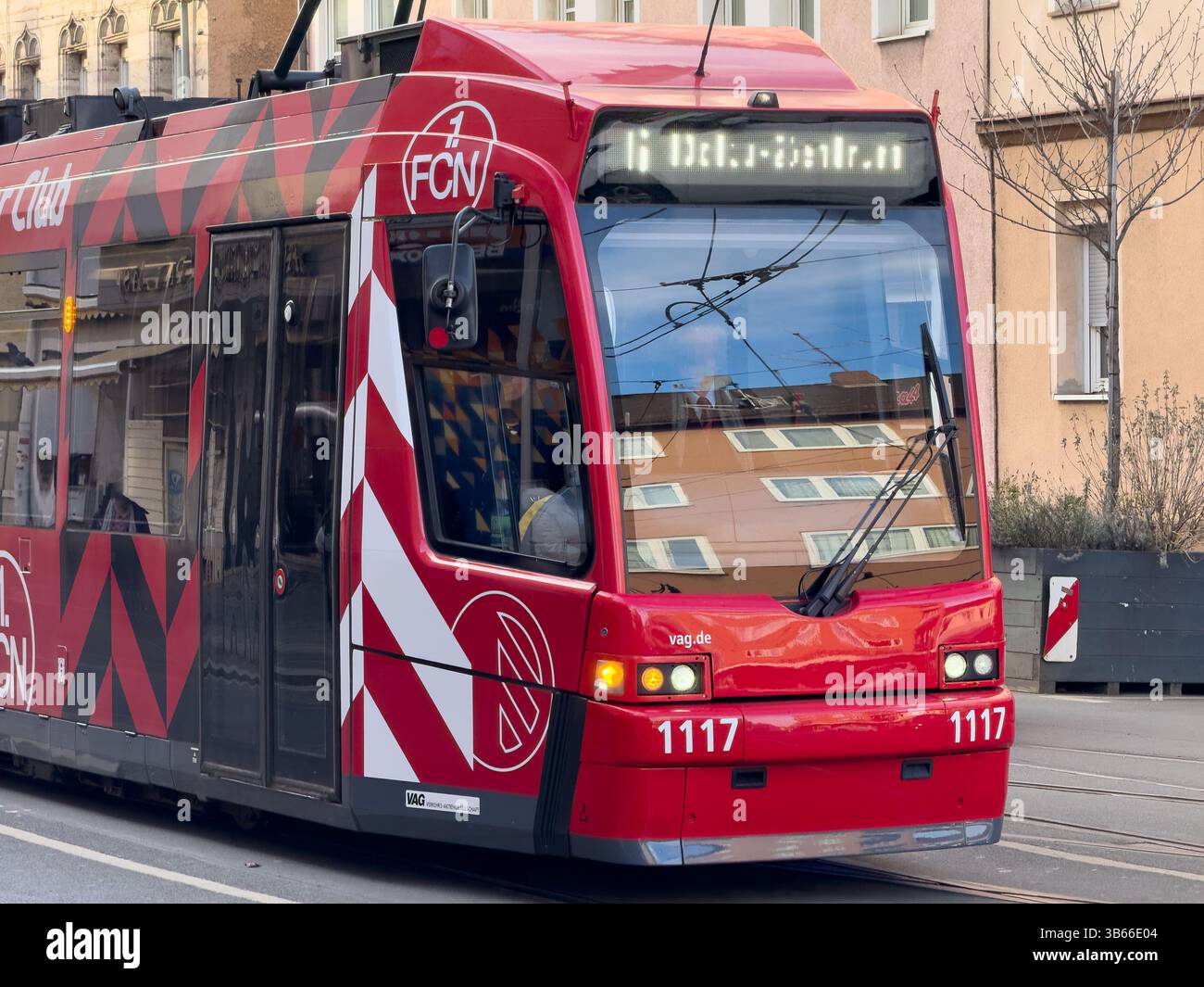 Nuremberg , Germany, 2025 Februar 8thTram: A red tram with black and ...